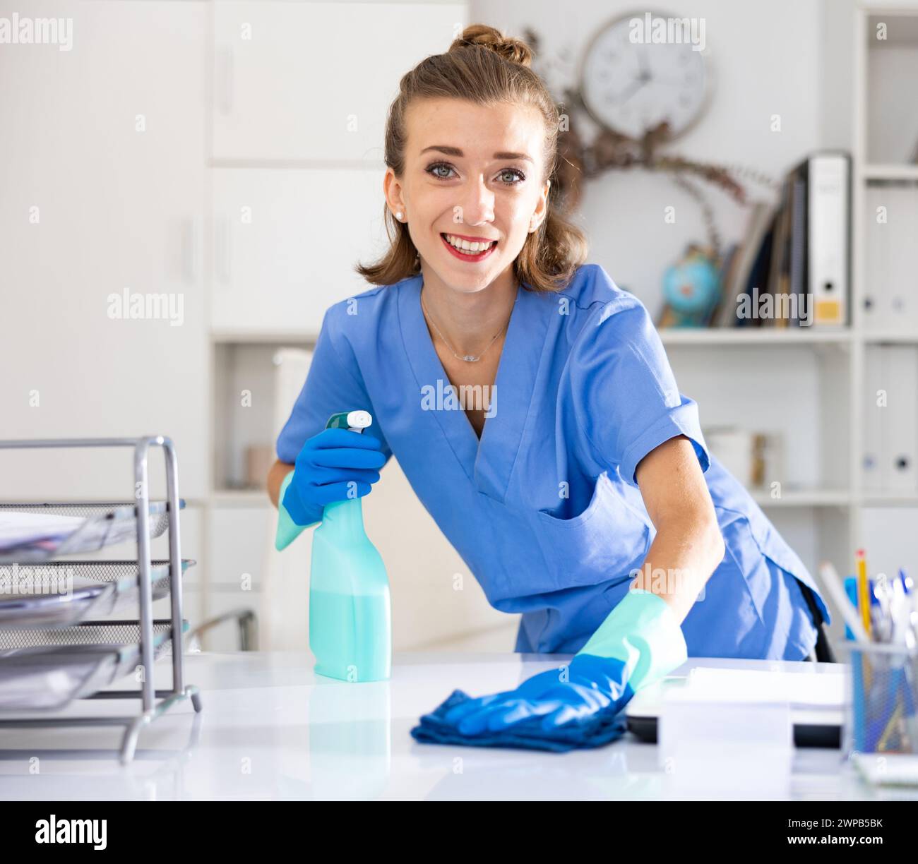 Cheerful cleaning lady wipes hi-res stock photography and images - Alamy
