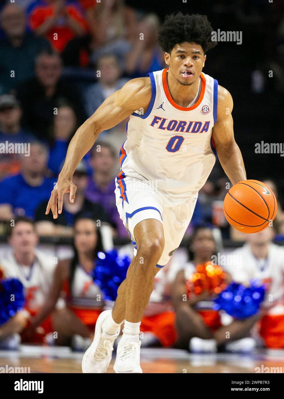 Florida guard Zyon Pullin (0) dribbles during the second half of an NCAA college basketball game ...