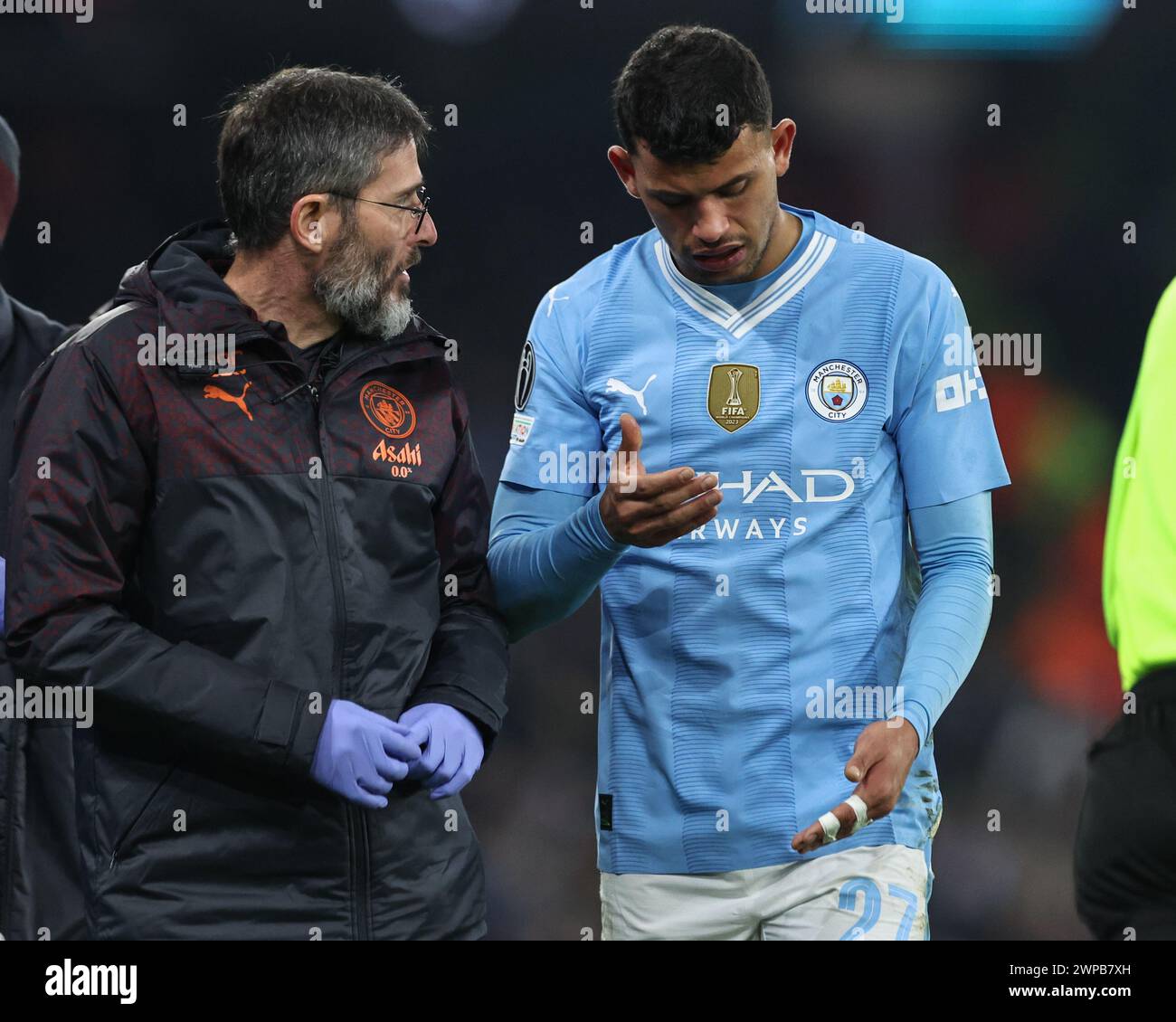 Matheus Nunes of Manchester City comes away from his injury with his ...