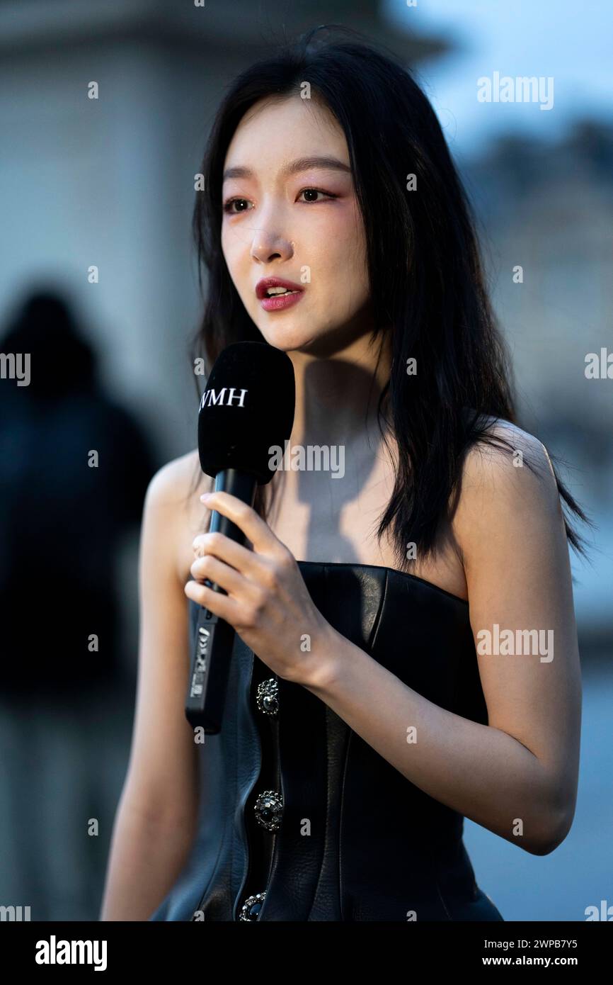 Dongyu Zhou is interviewed upon arrival for the Louis Vuitton Fall ...