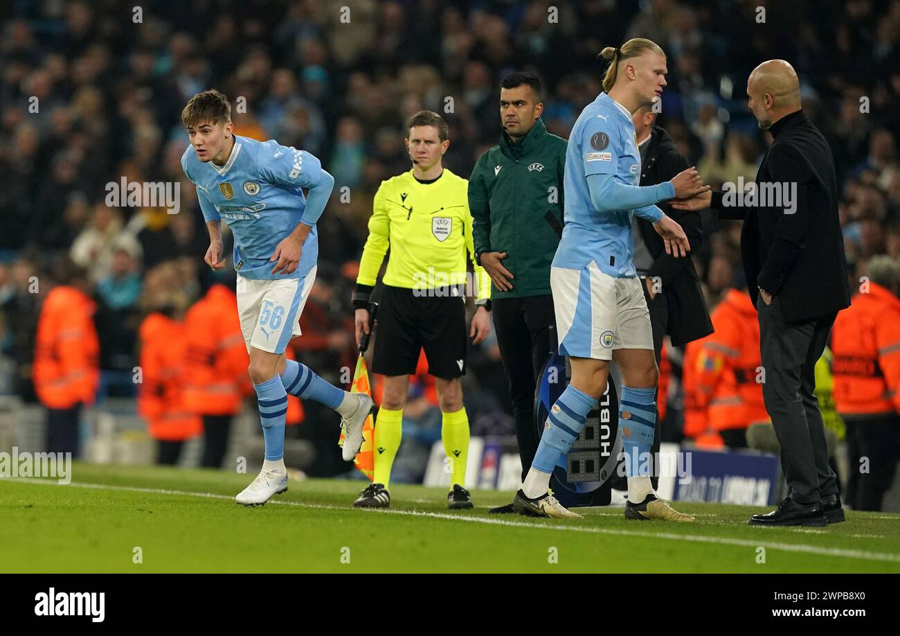 Manchester City's Jacob Wright (left) replaces Erling Haaland during ...