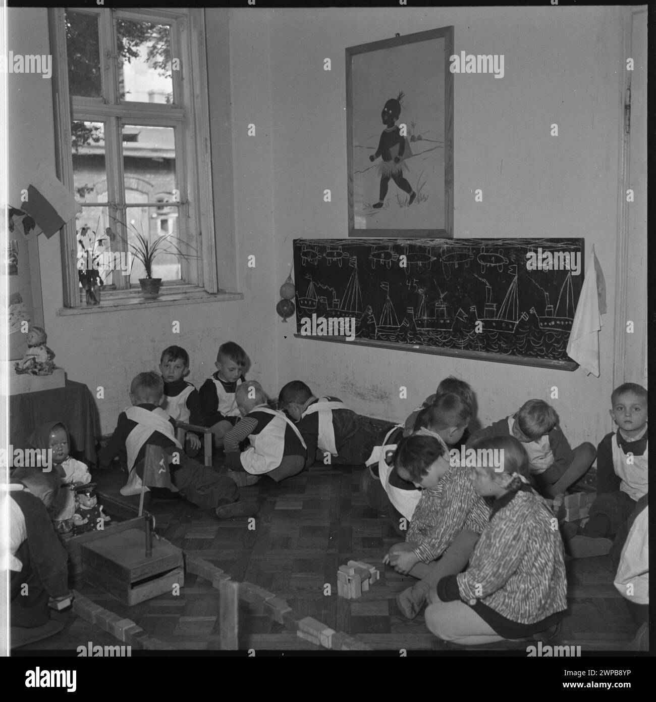 Children play in nursery Black and White Stock Photos & Images - Alamy