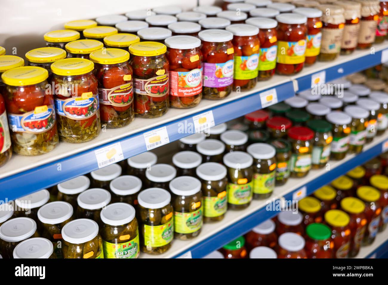 Russian goods store shelves have wide range of canned semi-finished ...