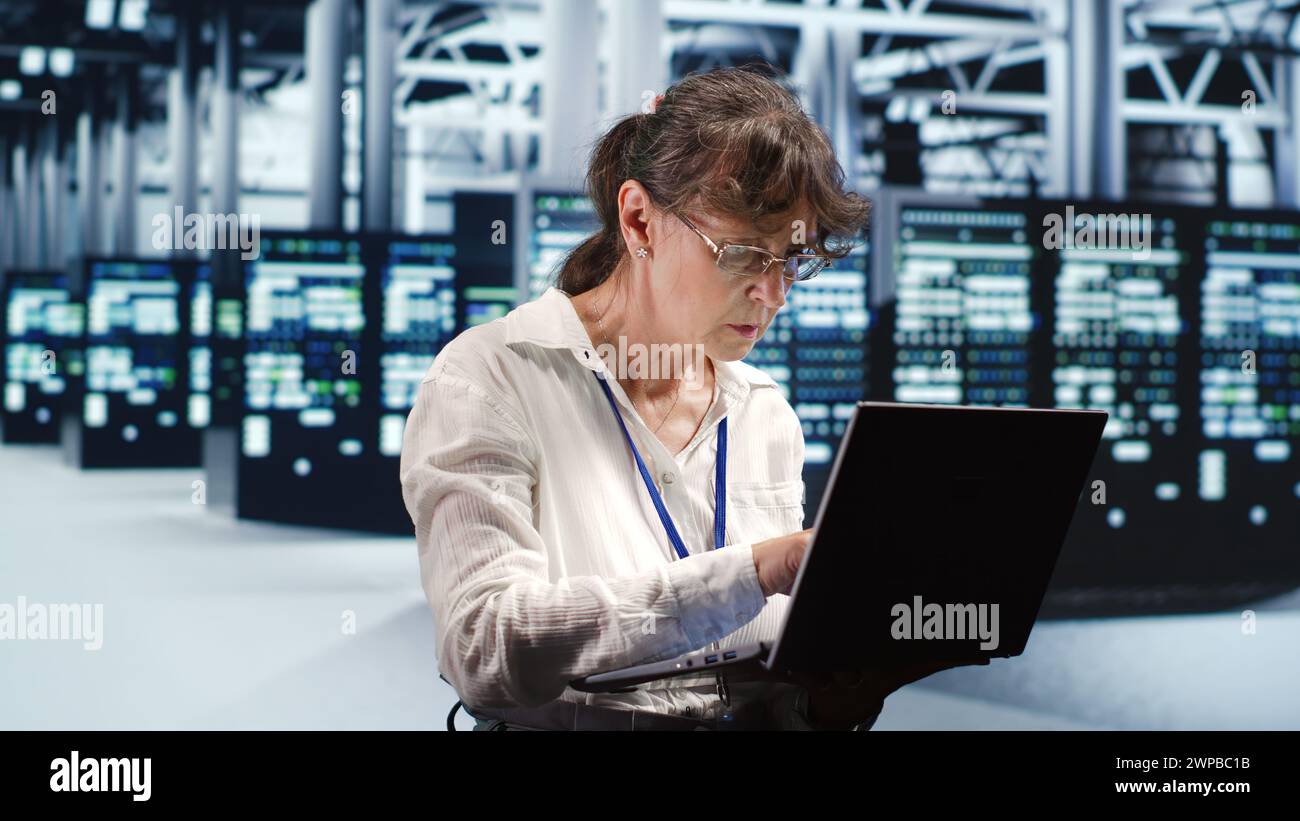 Proficient system administrator looking around revolutionary data center, preparing to start ...