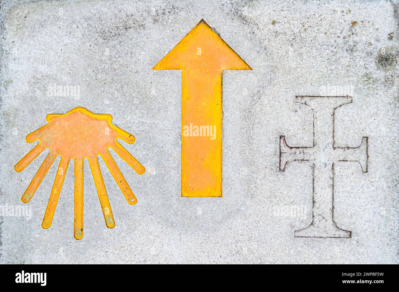 Camino de Santiago (St James Way) symbol (arrow and yellow shell ...