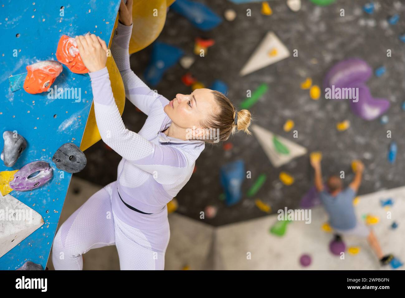 Woman rock climbing without equipment hi-res stock photography and ...