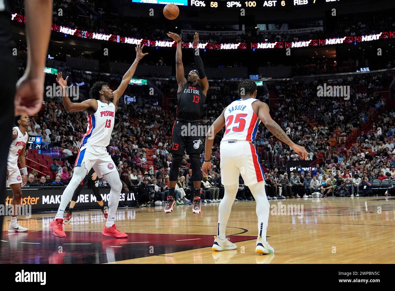 Miami Heat center Bam Adebayo (13) shoots over Detroit Pistons center ...