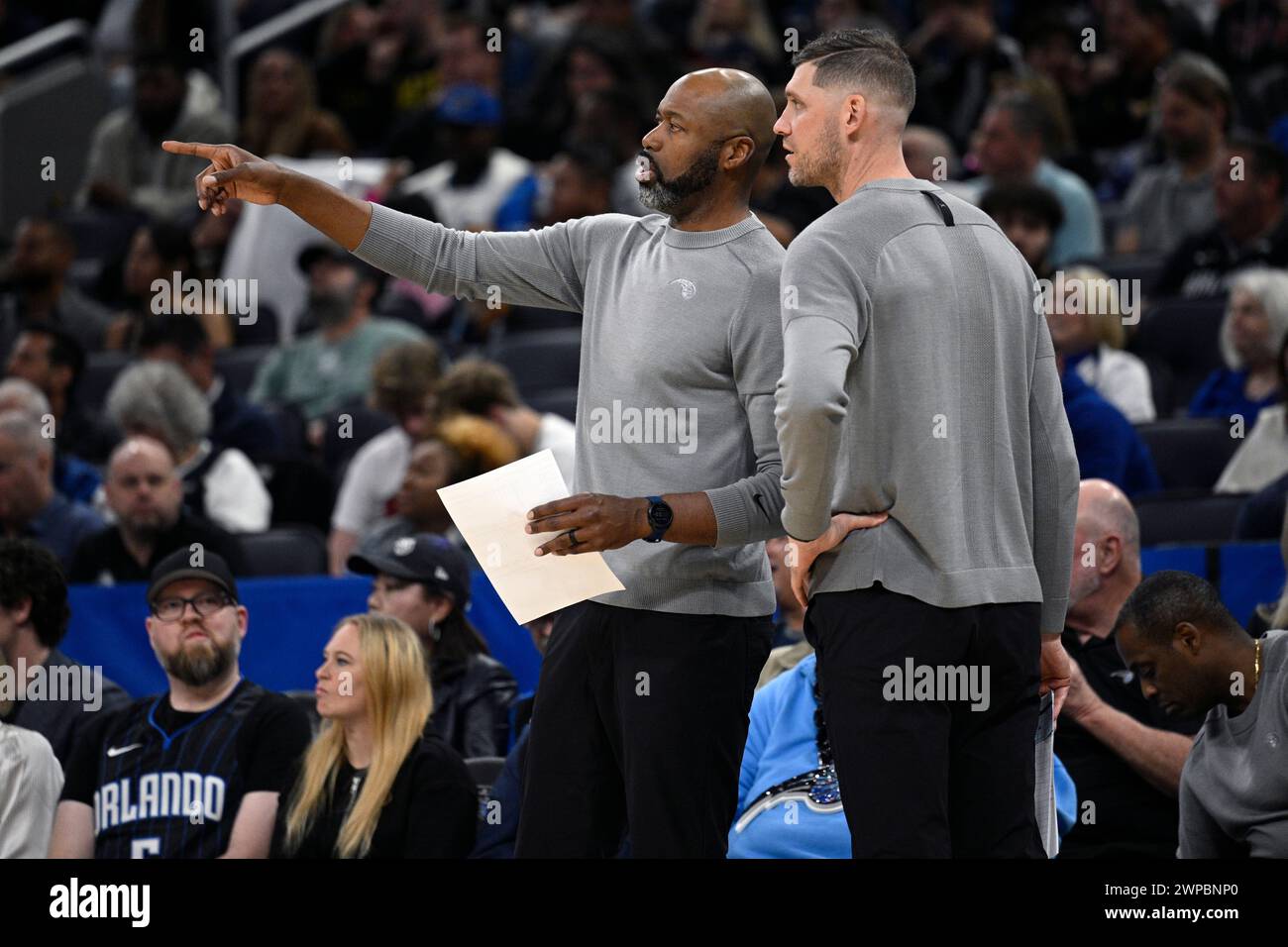 Orlando Magic head coach Jamahl Mosley, left, chats with assistant ...