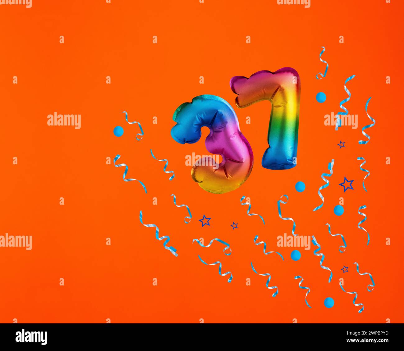 Confetti explosion with number 37 balloon - Celebration on orange ...