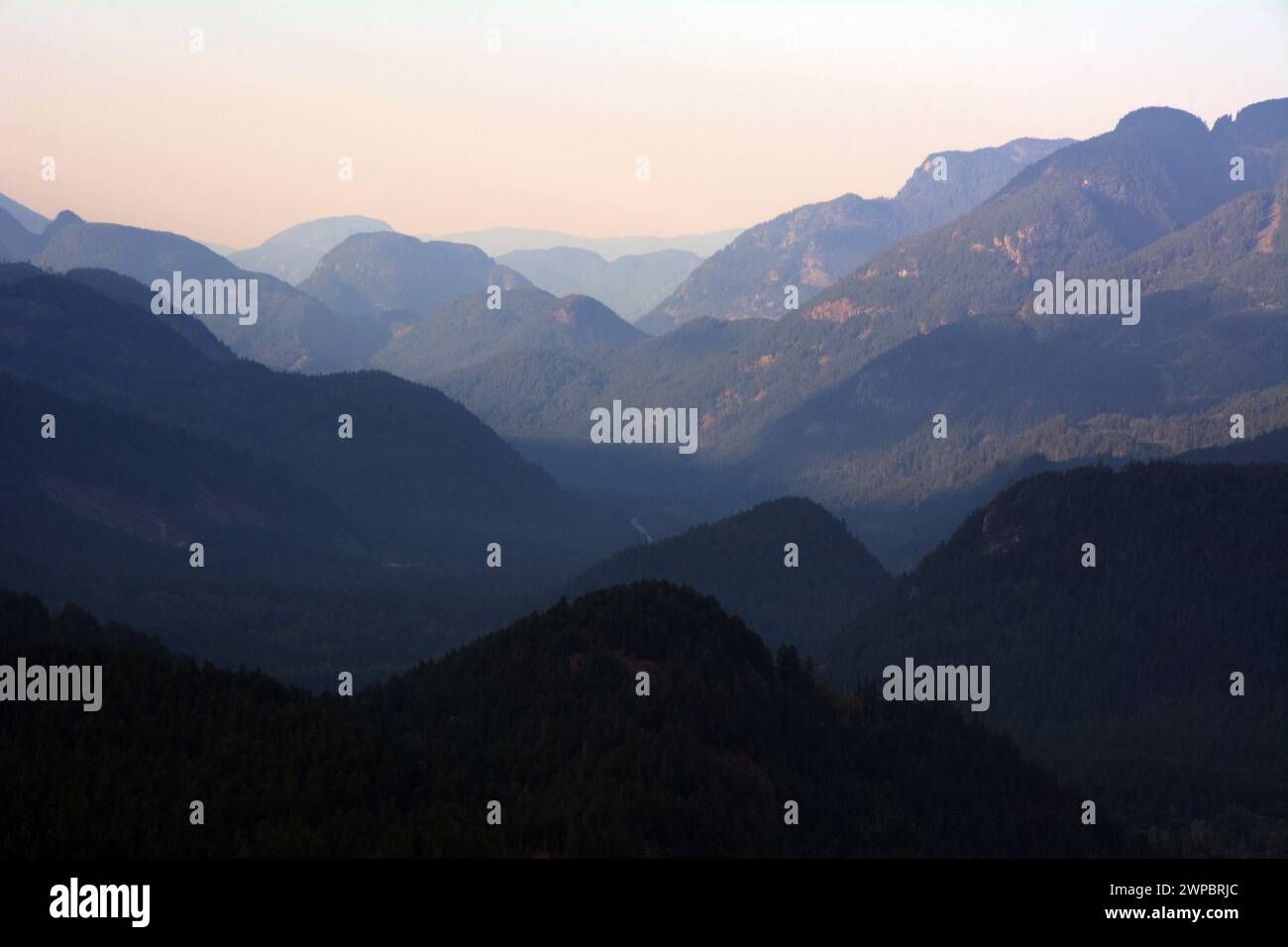 Looking up the Fraser River Valley and Canyon from the mountains above ...