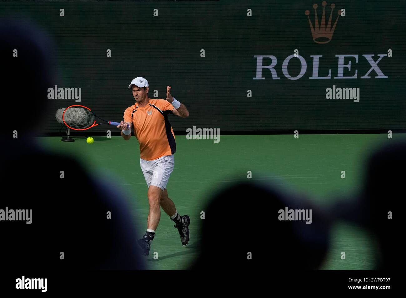Andy Murray, of Britain, hits a return to David Goffin, of Belgium ...