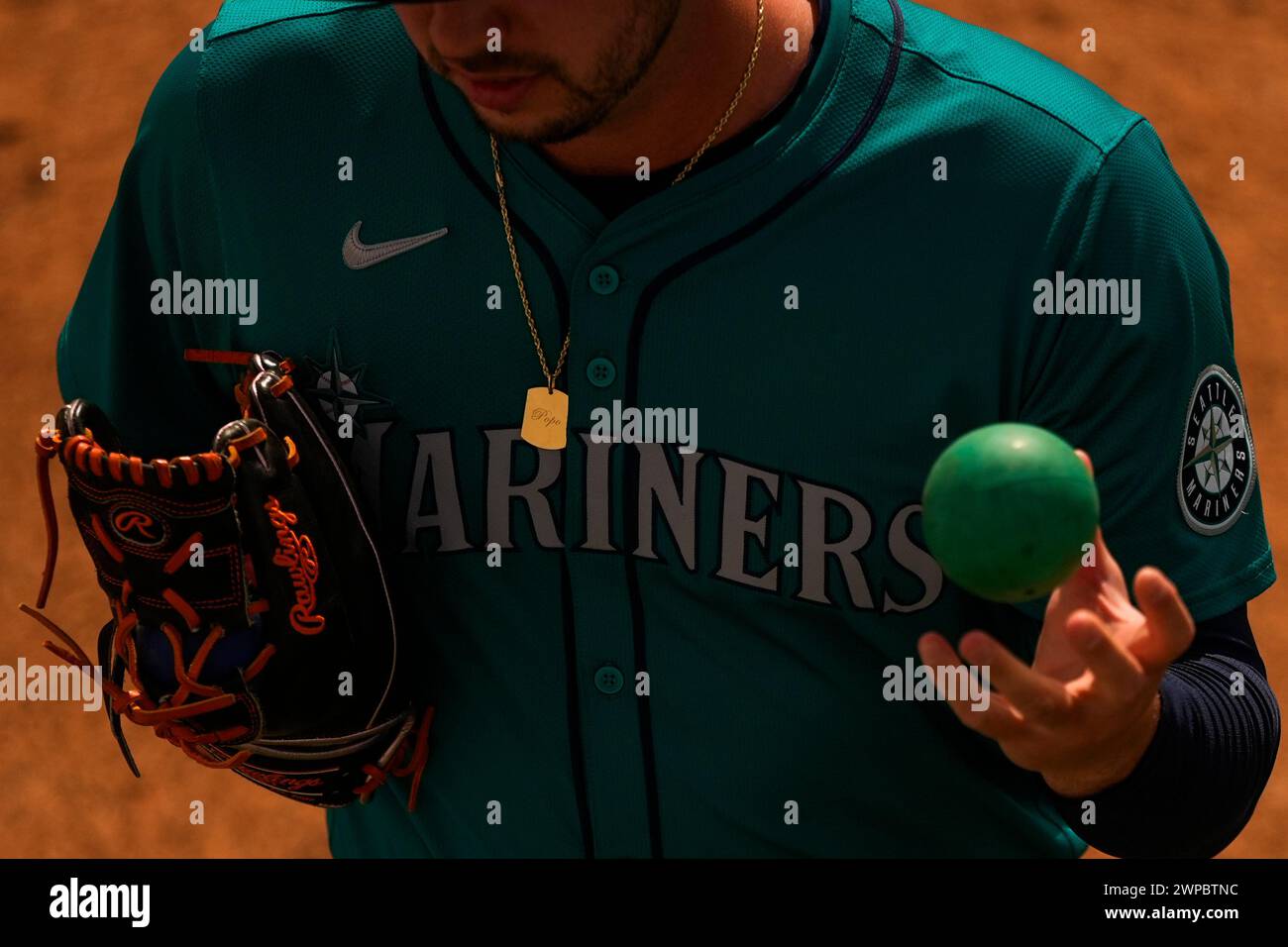 Seattle Mariners relief pitcher Tayler Saucedo uses a rubber ball to ...