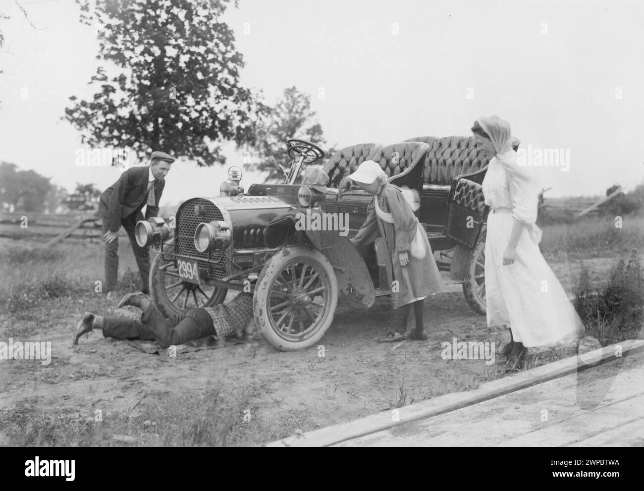 Fixing the car Ontario, Canada. 1908. Vintage Historical Photograph ...