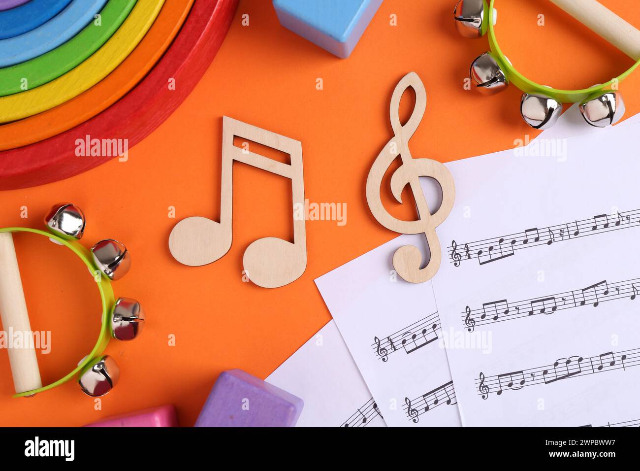 Tools for creating baby songs. Flat lay composition with wooden notes ...