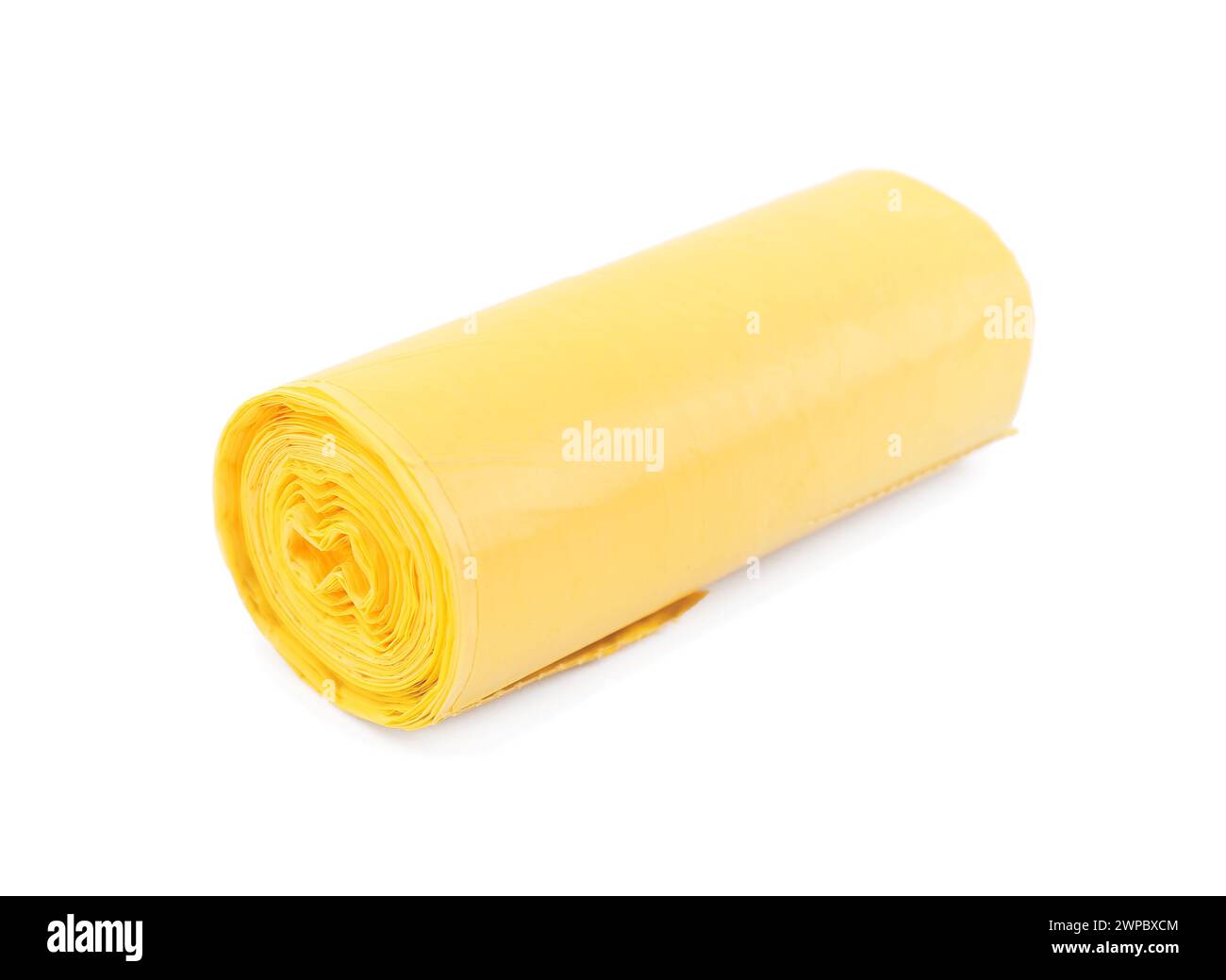 Roll of yellow garbage bags isolated on white Stock Photo - Alamy