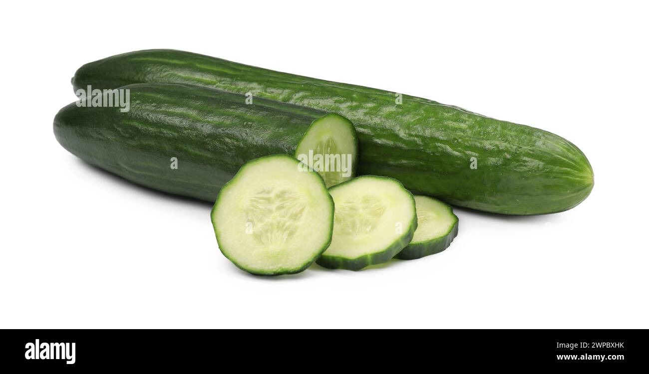 Whole and cut long cucumbers isolated on white Stock Photo - Alamy