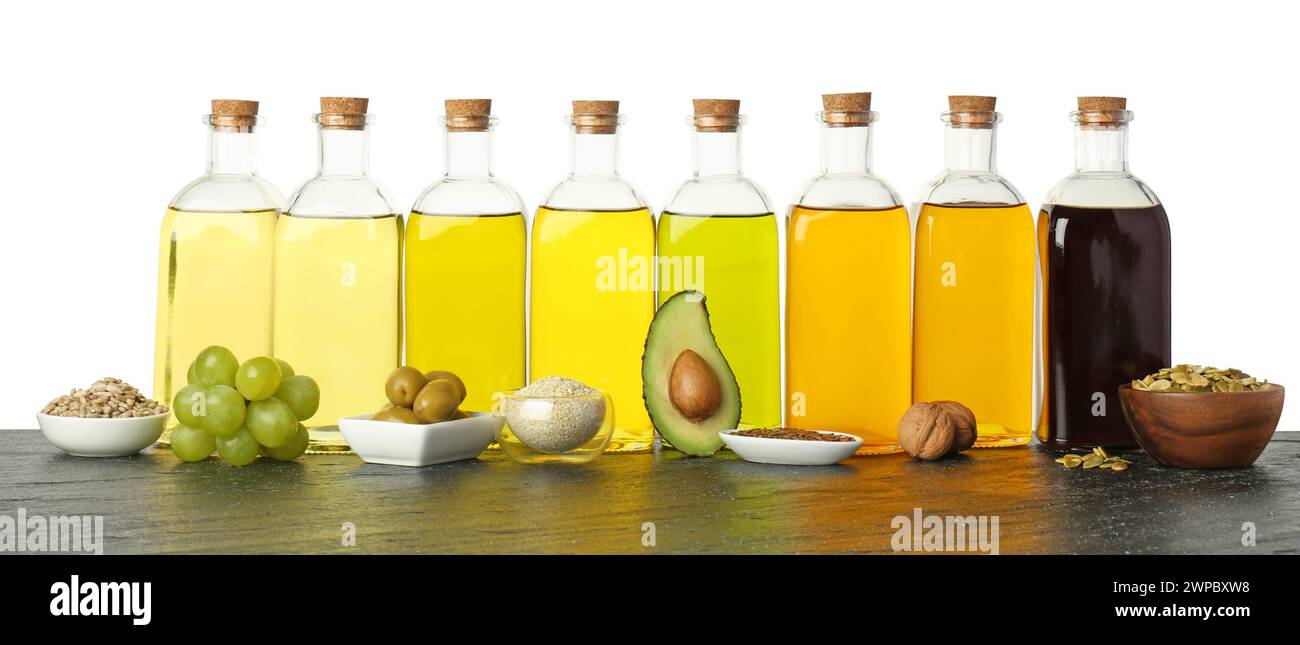 Vegetable fats. Bottles of different cooking oils and ingredients on ...