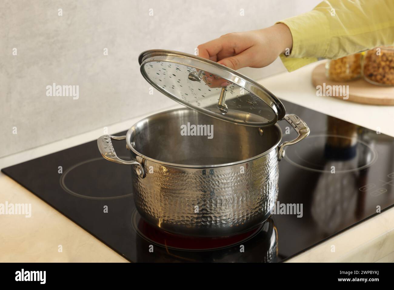 Woman cooking soup in pan hi-res stock photography and images - Alamy