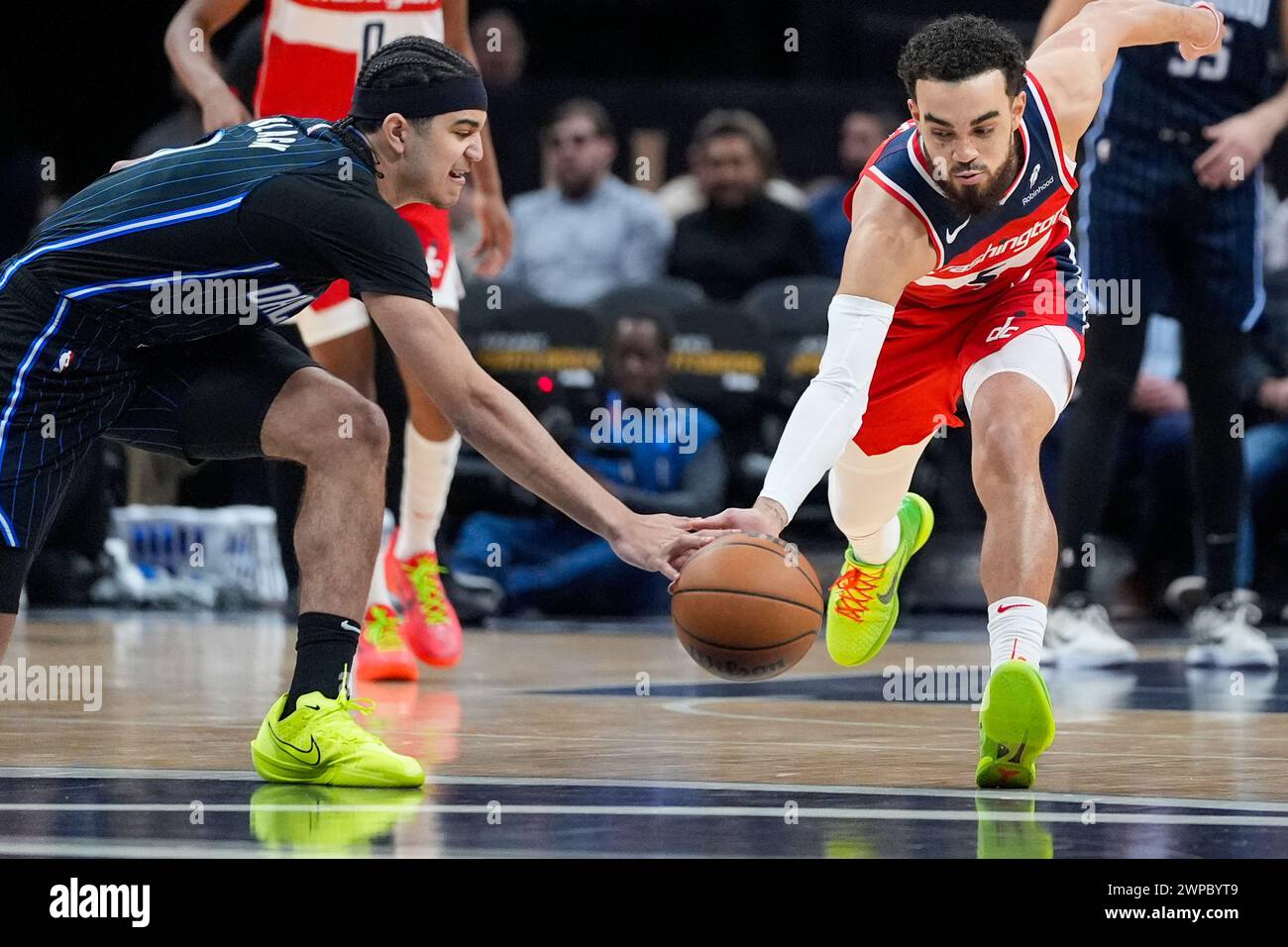 Orlando Magic guard Anthony Black, left, and Washington Wizards guard ...
