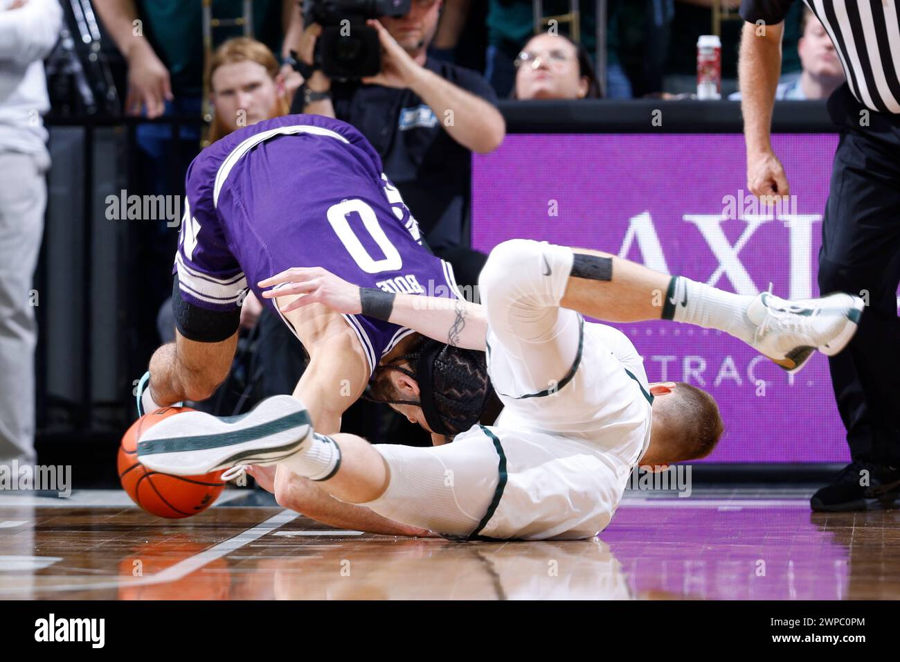 Michigan State center Carson Cooper, right, and Northwestern guard Boo ...