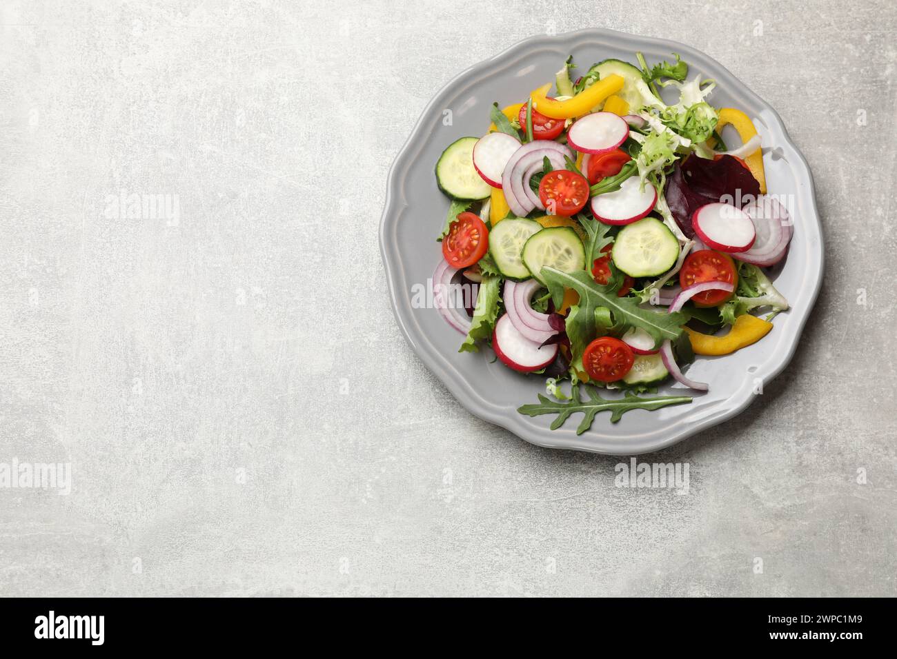 Balanced diet and vegetarian foods. Plate with different delicious ...