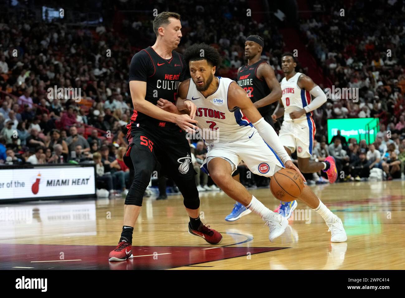 Miami Heat forward Duncan Robinson (55) defends Detroit Pistons guard ...