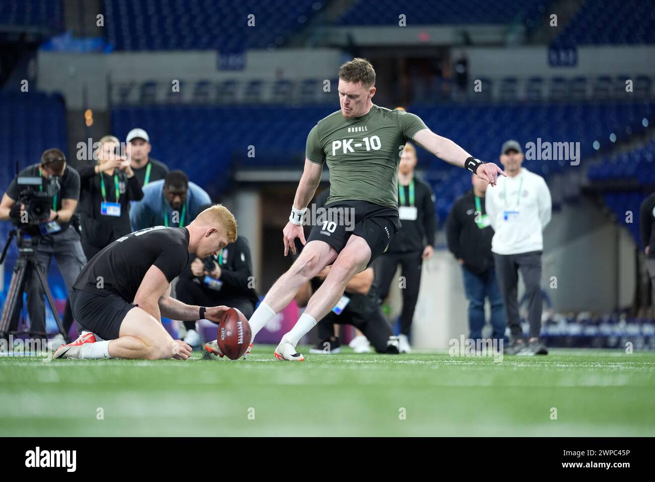 Kicker Rory Beggan of Ireland runs a drill at the NFL football scouting ...