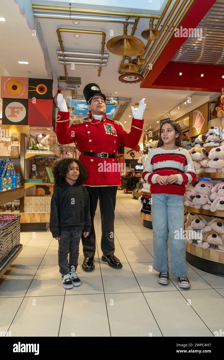 Cancer patients 4-year old Joshy Ford and 10-year old Zoe Leroy with Johnny Tammaro, Toy Soldier ...