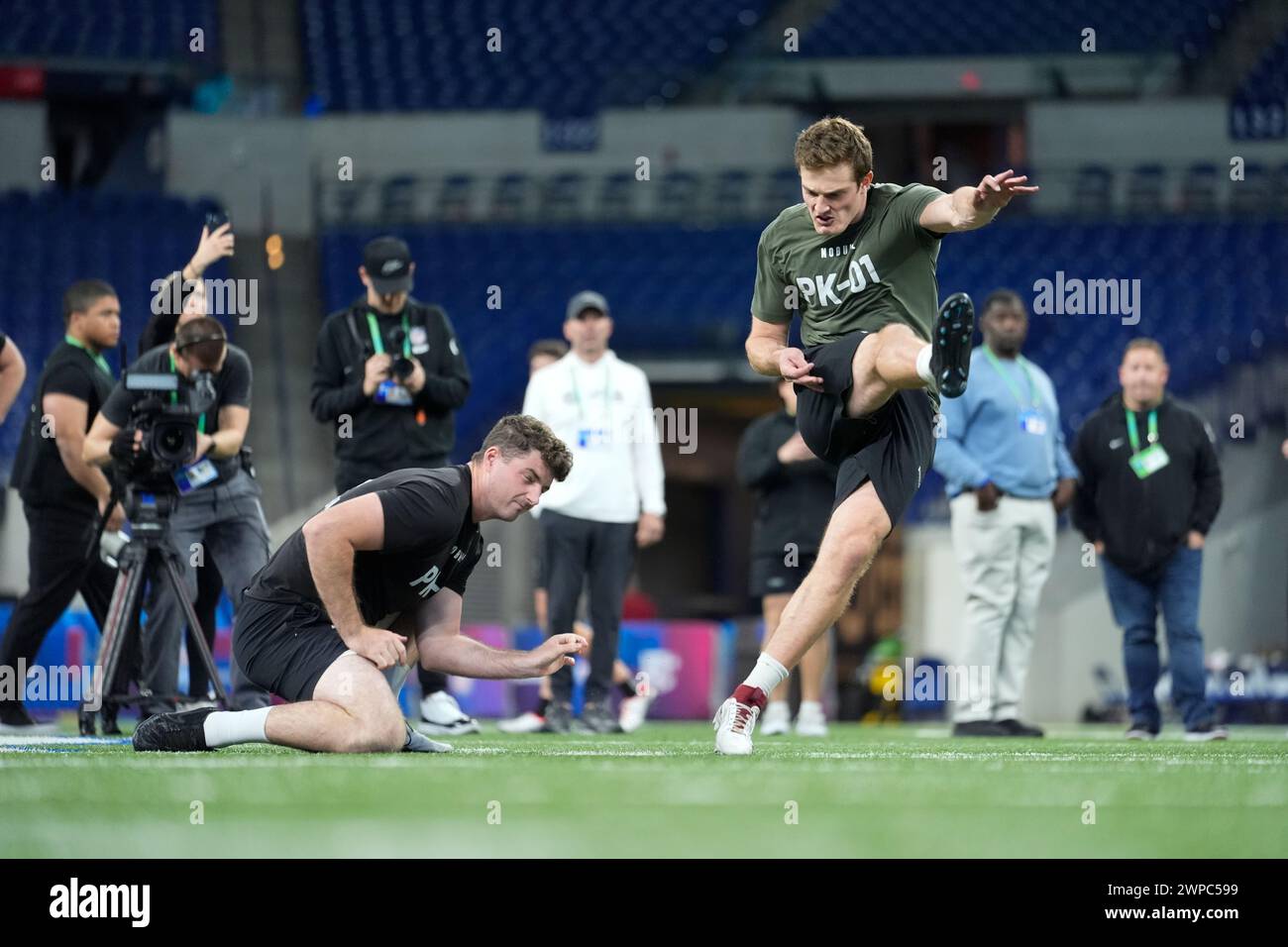 Stanford kicker Joshua Karty runs a drill at the NFL football scouting ...
