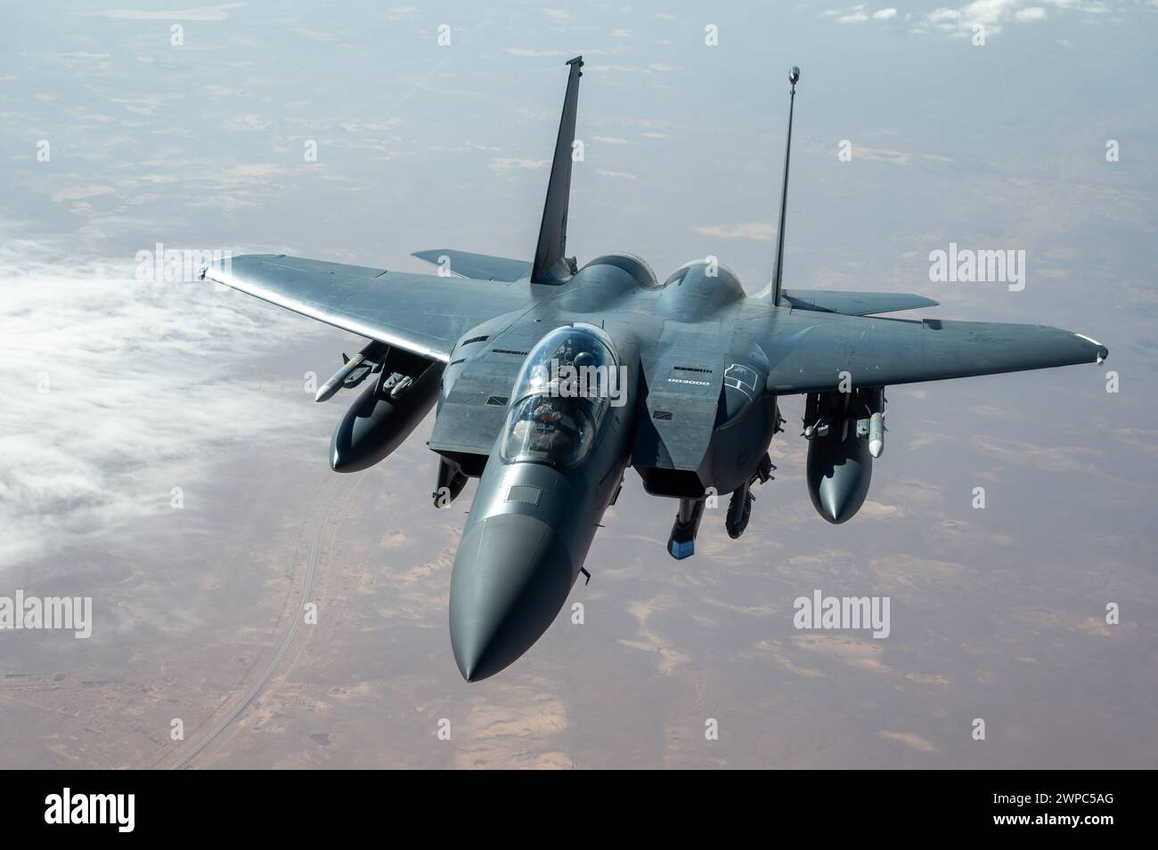 A U.S. Air Force F-15E Strike Eagle soars over an undisclosed location ...