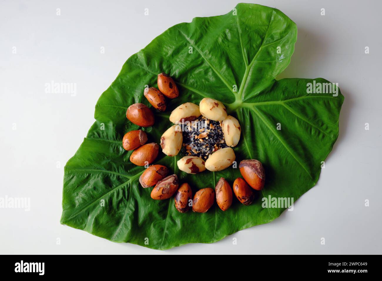 Top view boiled durian seeds that peel ready to eat on green leaf ...