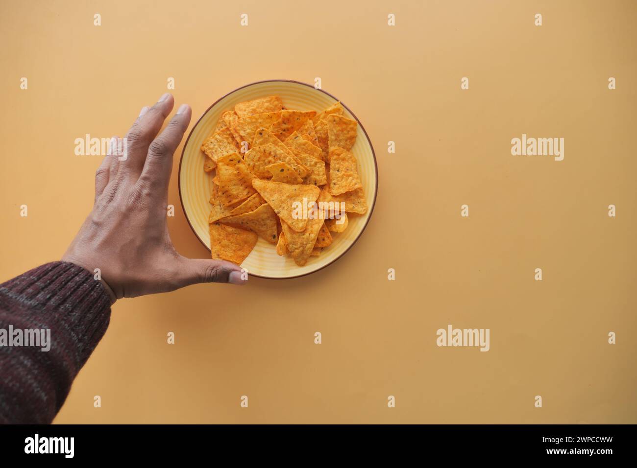 Top view hand pick chips hi-res stock photography and images - Alamy