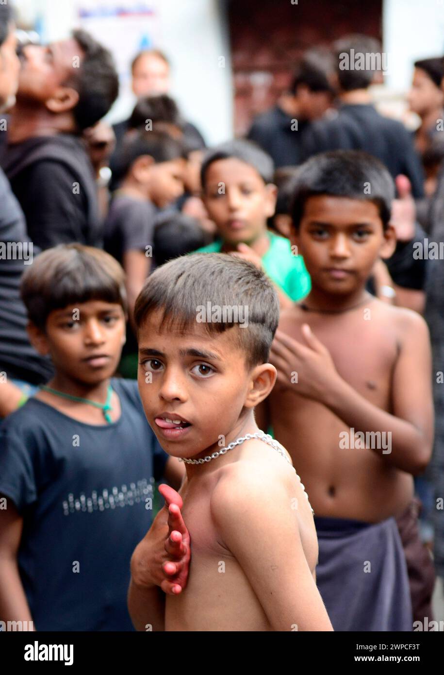 Shia boys flogging themselves during the Muharram mourning festival of ...