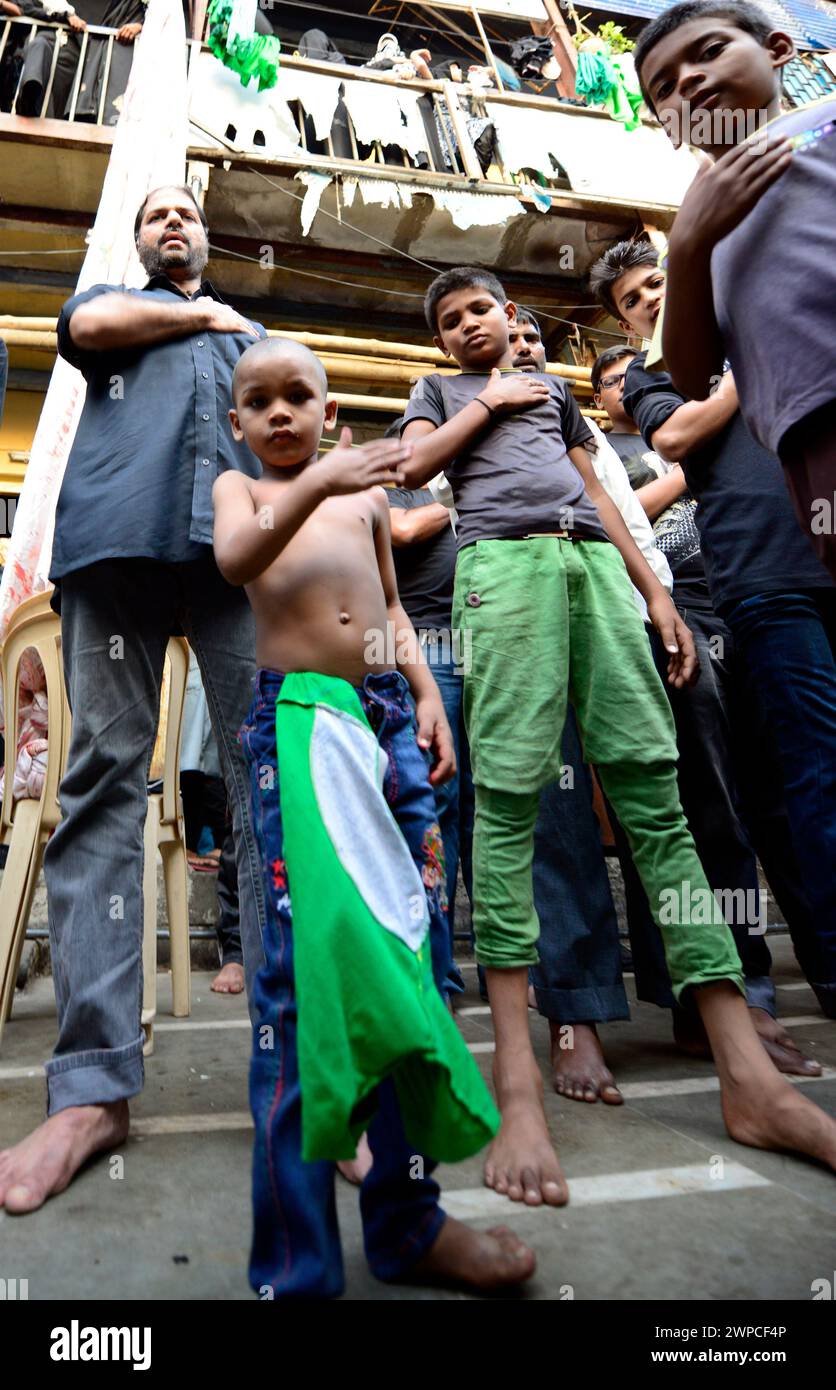 Shia men flogging themselves during the Muharram mourning festival of ...