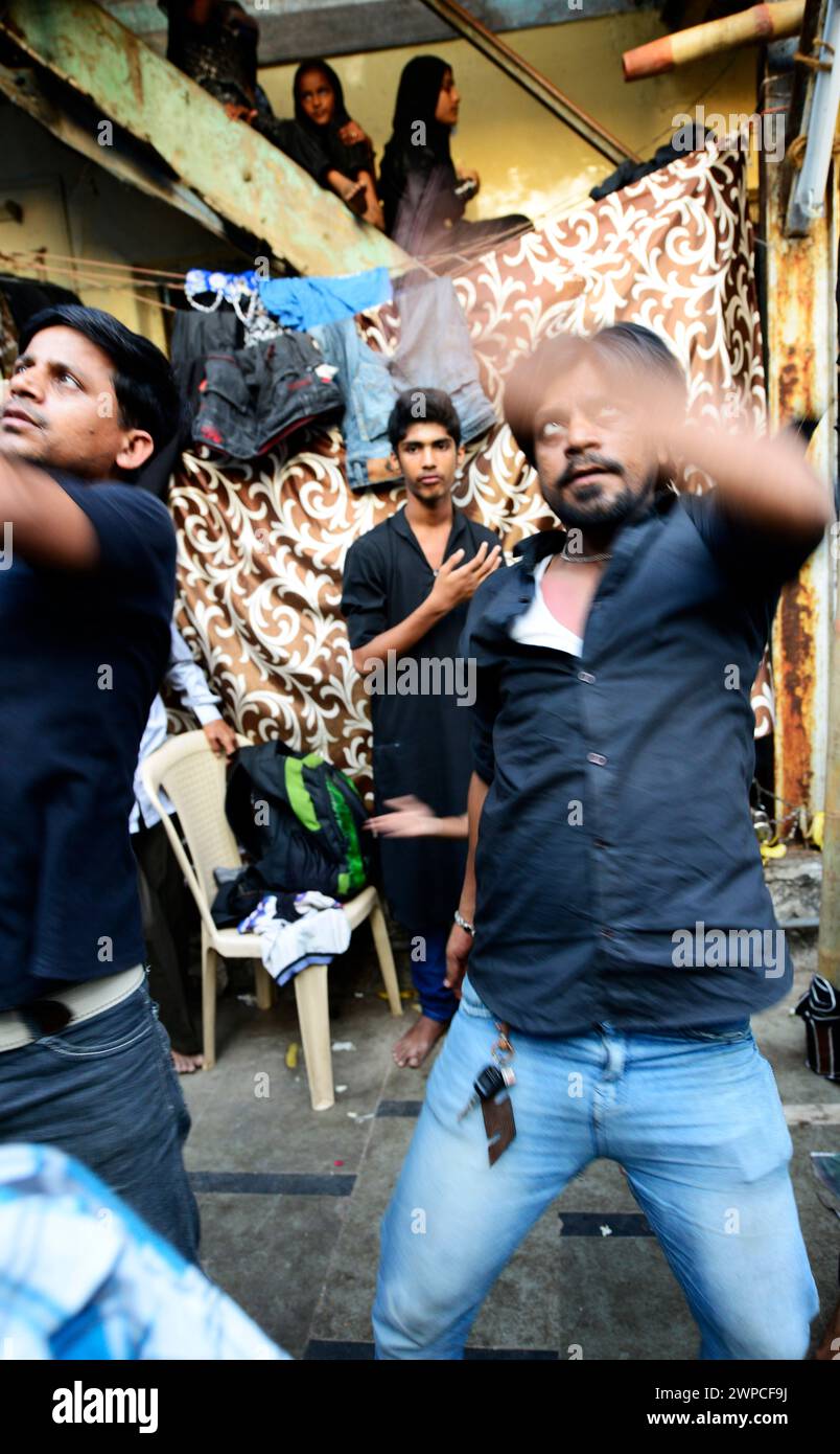 Shia men flogging themselves during the Muharram mourning festival of ...