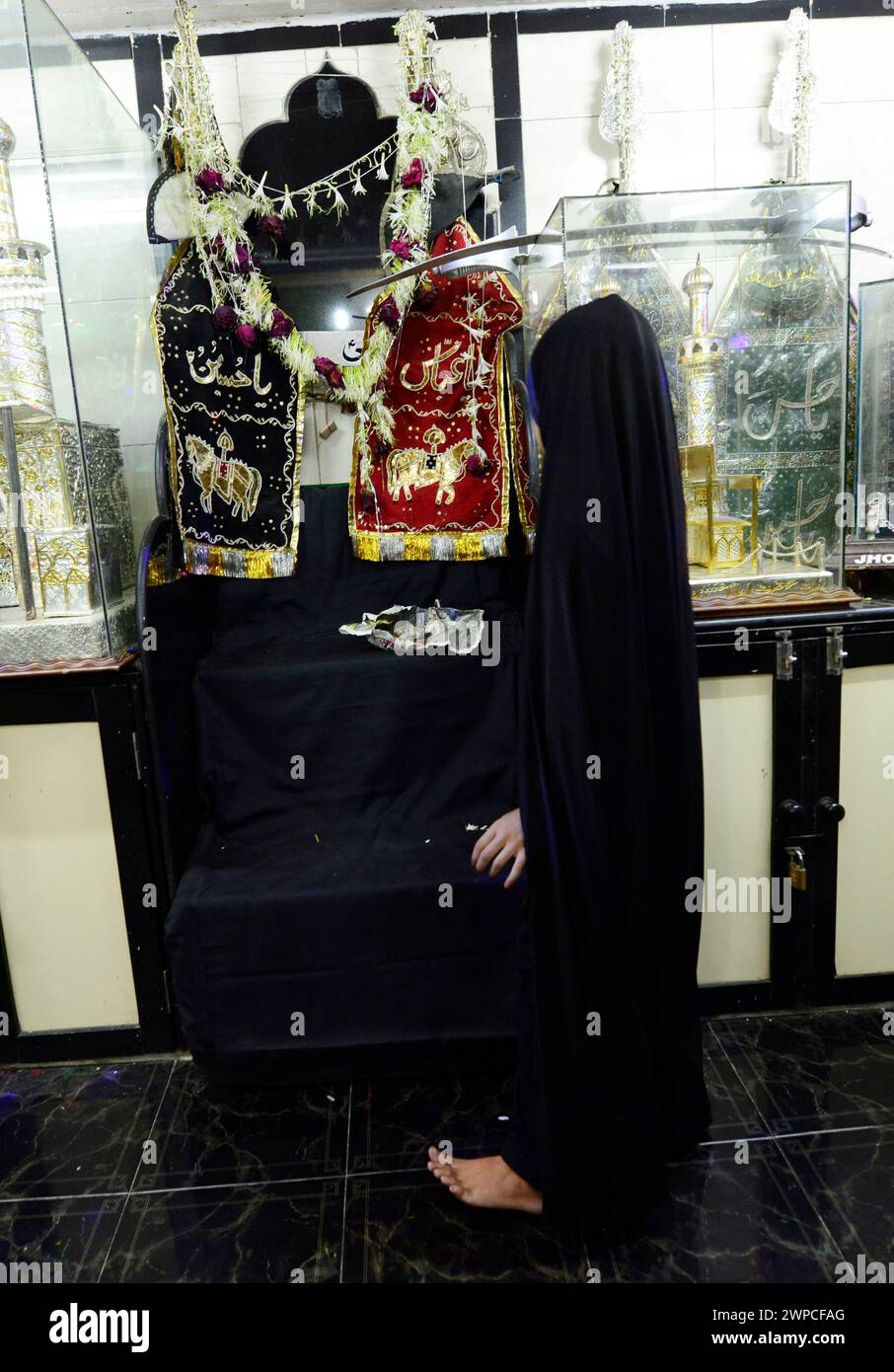 Shia Muslim pilgrims visiting sites representing the story of the ...