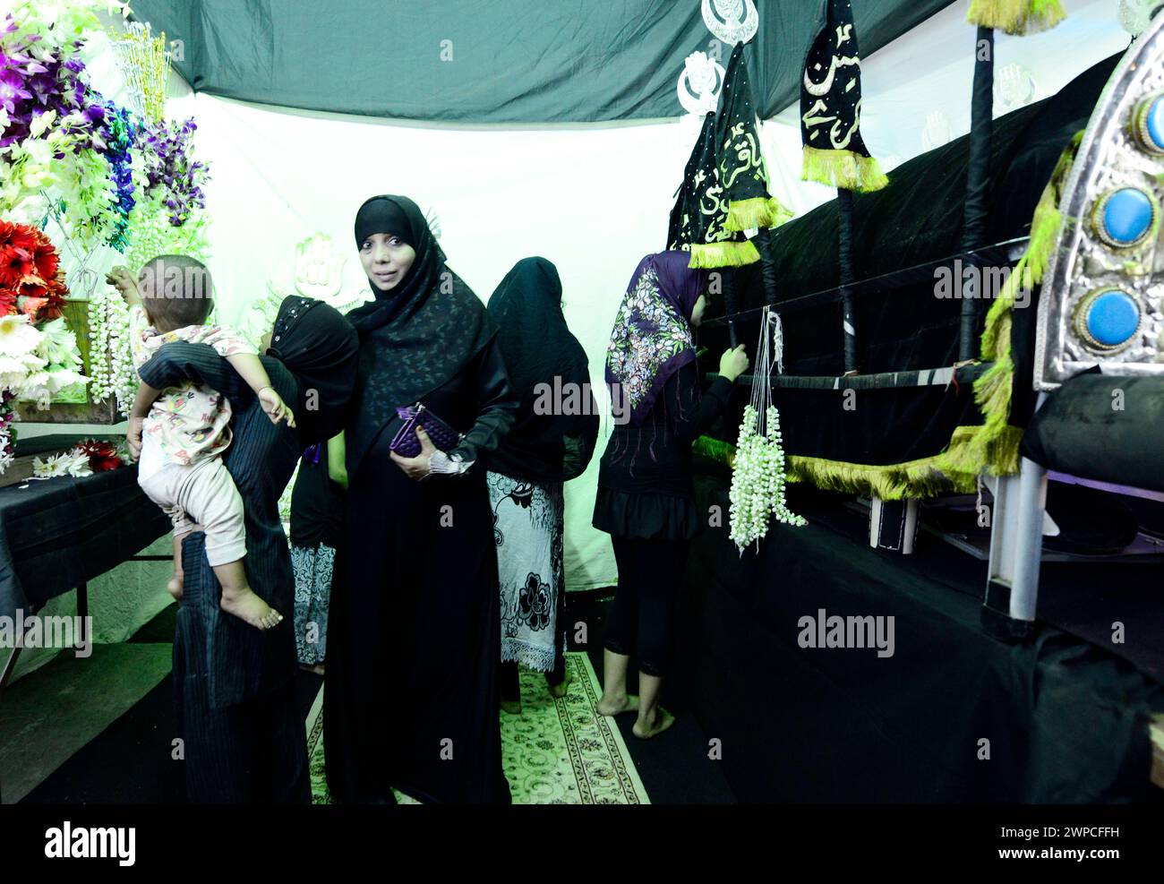 Shia Muslim pilgrims visiting sites representing the story of the ...