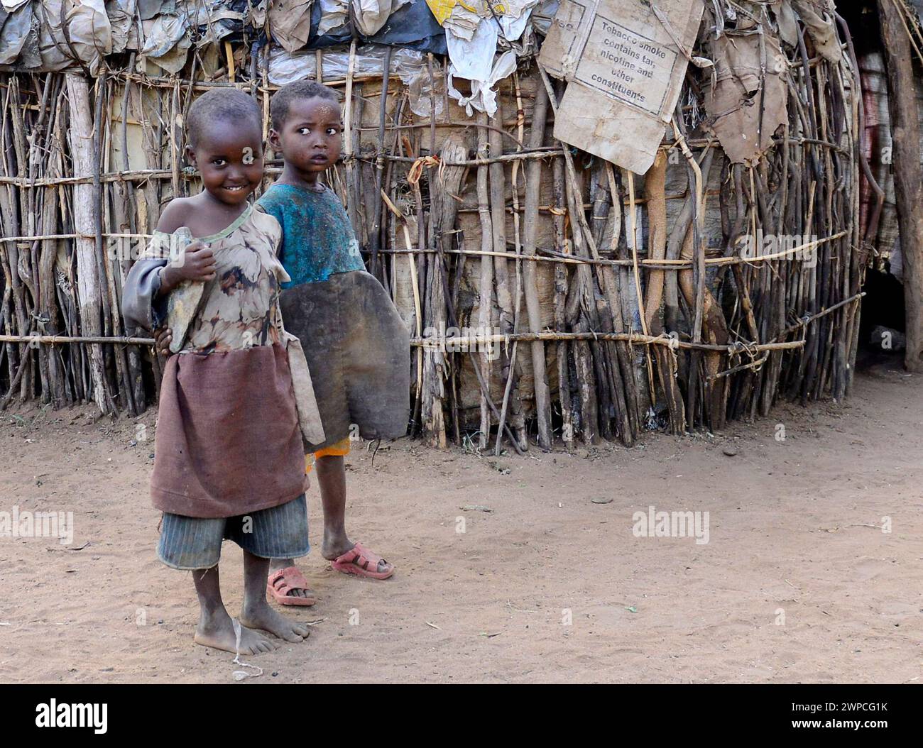 Young girls standing outside their hut in Ngurunit, North Kenya Stock ...