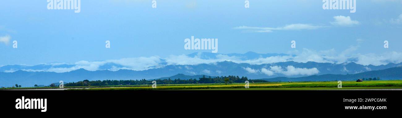 Misty mountains after a rainy morning seen from the Kaladan river in ...