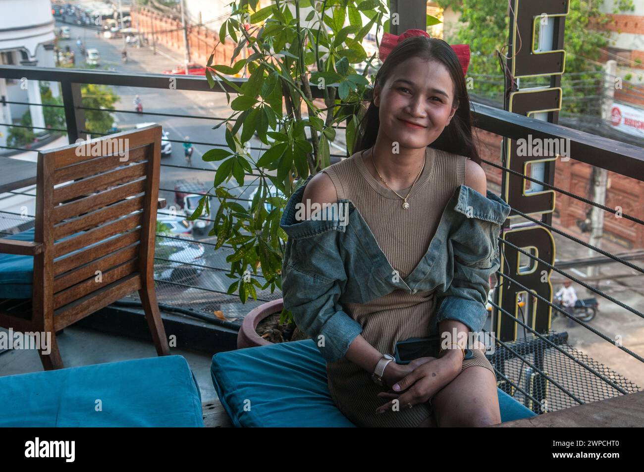 Portrait of a beautiful young Cambodian woman, part of generation Z ...