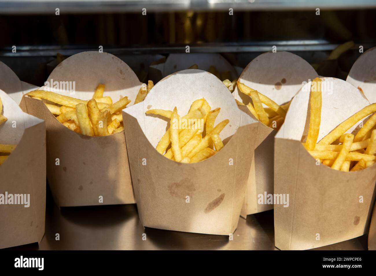 French fries in the package. Street food. Fast food Stock Photo - Alamy