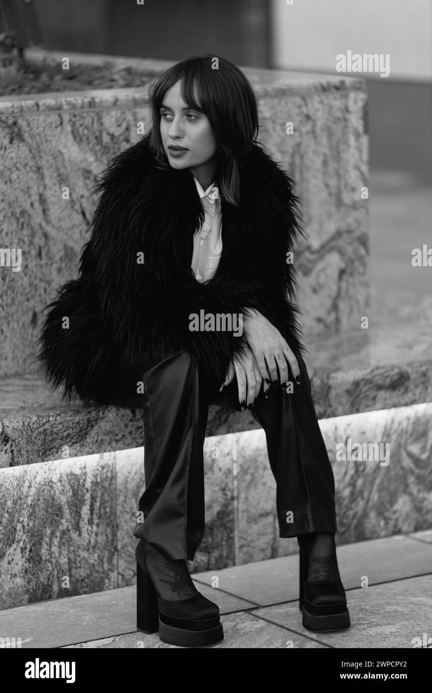 Outdoor fashion portrait of young beautiful girl wearing trendy black ...