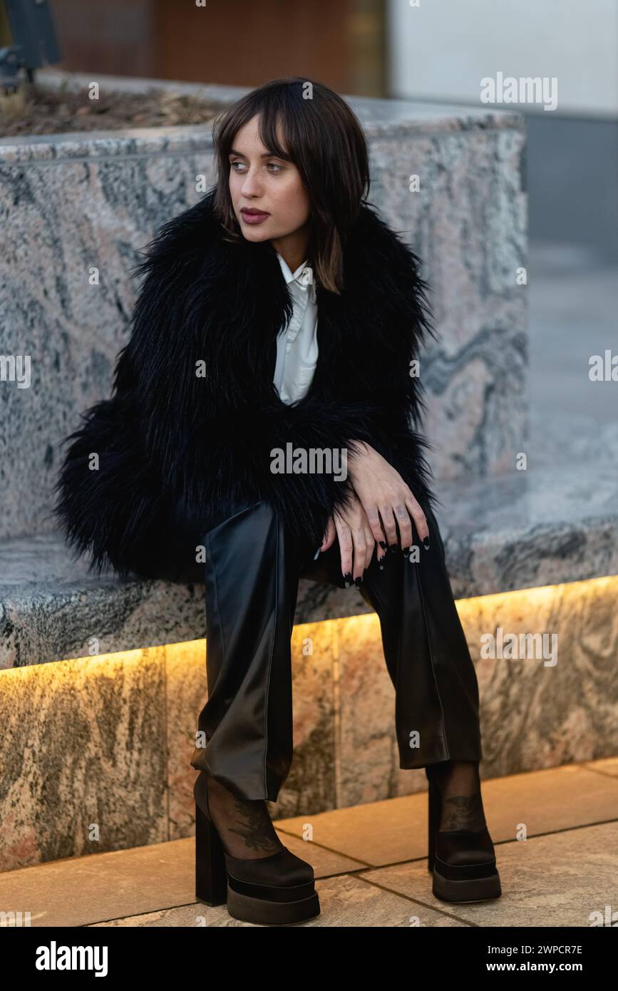 Outdoor fashion portrait of young beautiful girl wearing trendy black ...