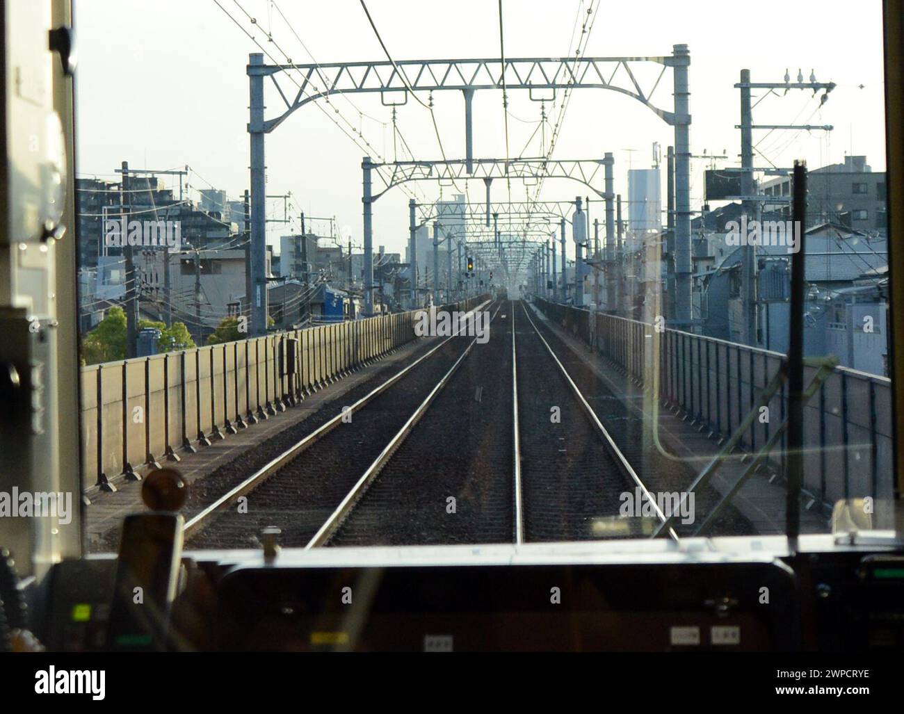 A train journey on the local train from Kobe to Osaka, Japan Stock ...