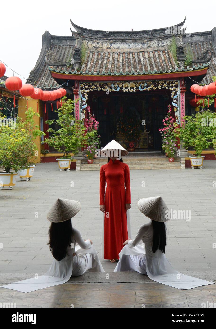 Vietnamese models in a shoot at the Hoa Van Le Nghia Buddhist temple in ...