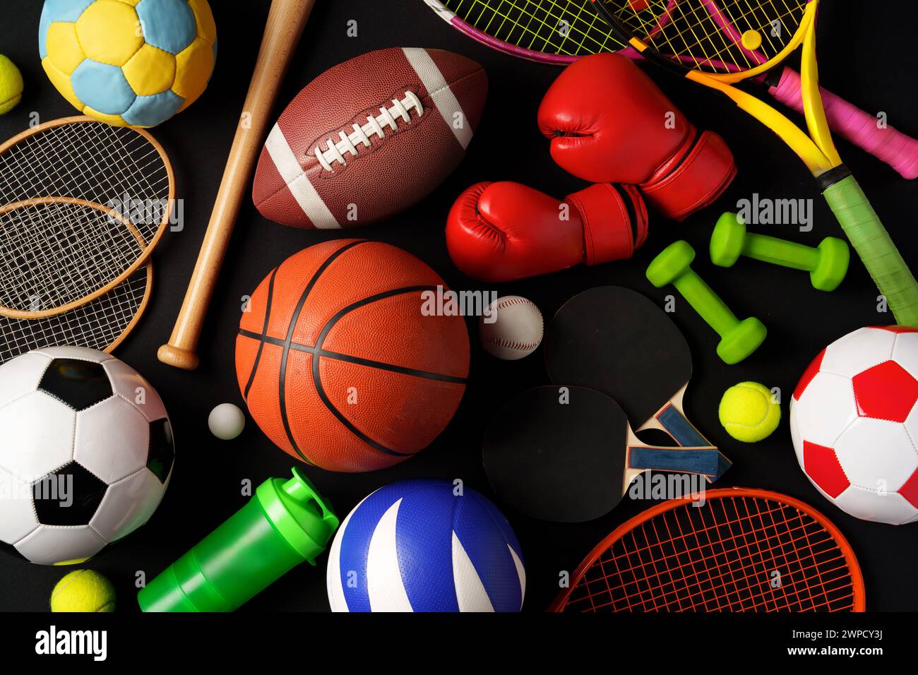 Various sports equipment on black background studio shot Stock Photo ...