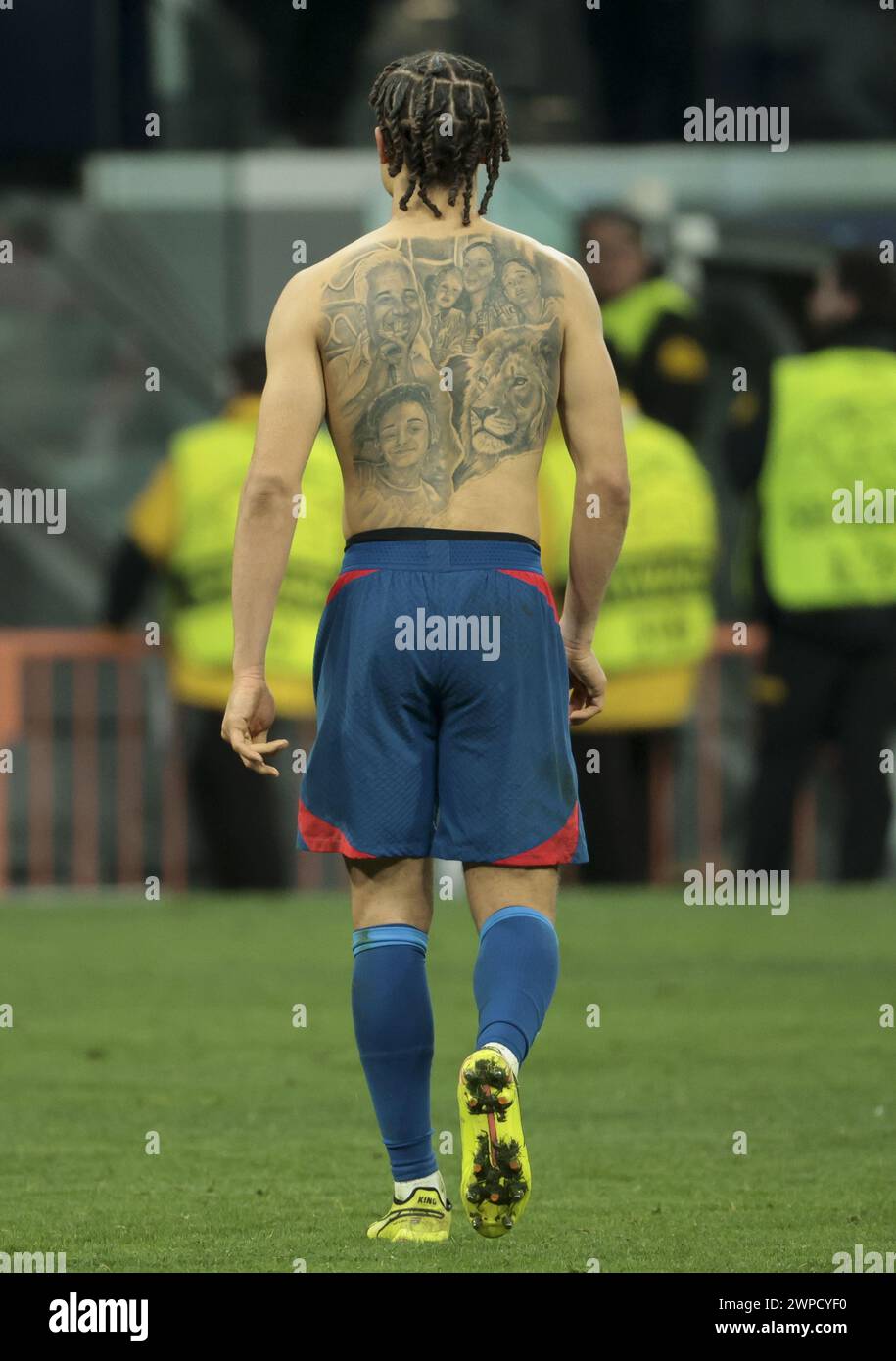 Xavi Simons of RB Leipzig showing his tattoos following the UEFA Champions League, Round of 16 ...