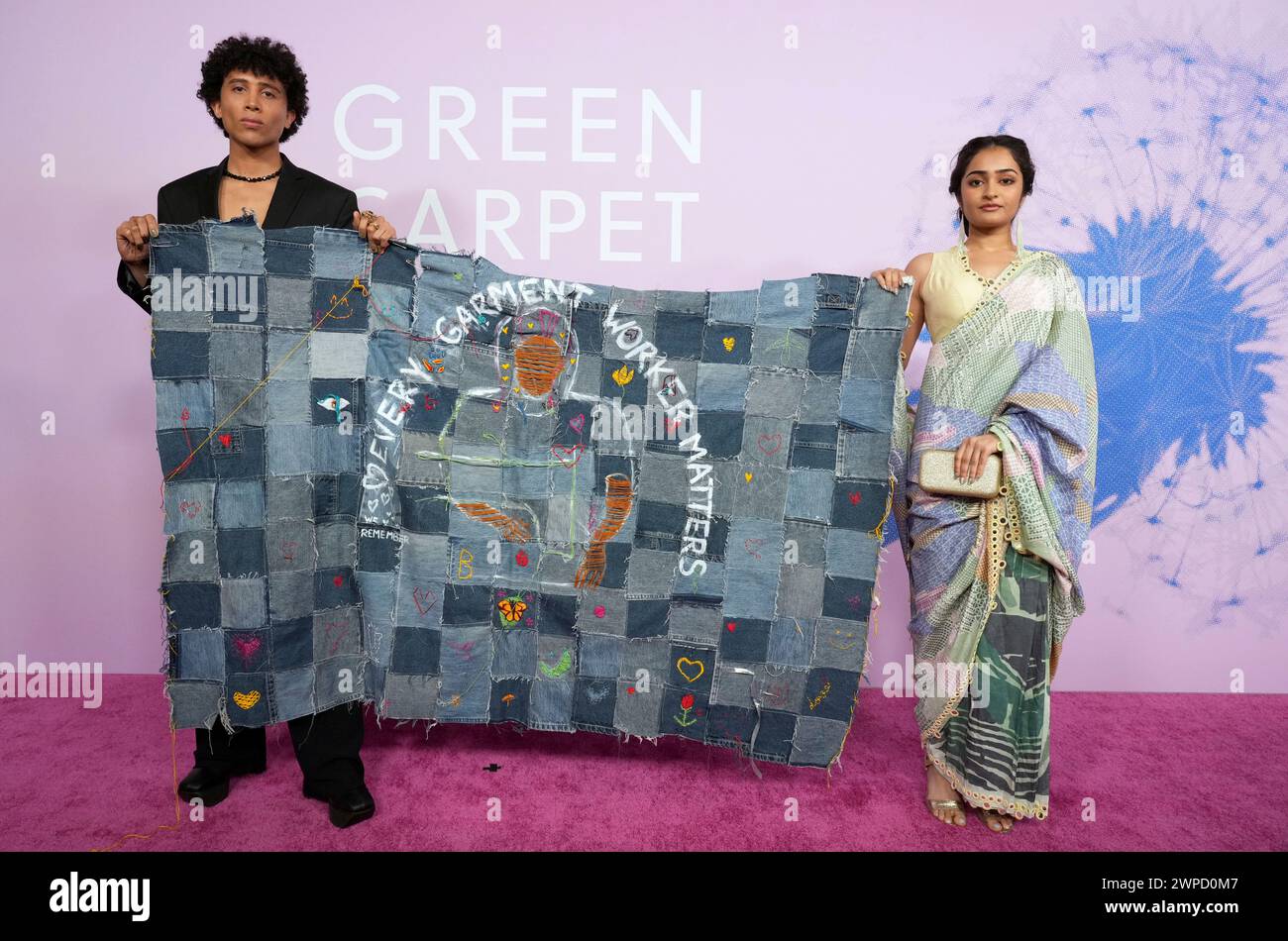 Lionel Hurtado, left, and Neha Alety arrive at the Green Carpet Fashion ...