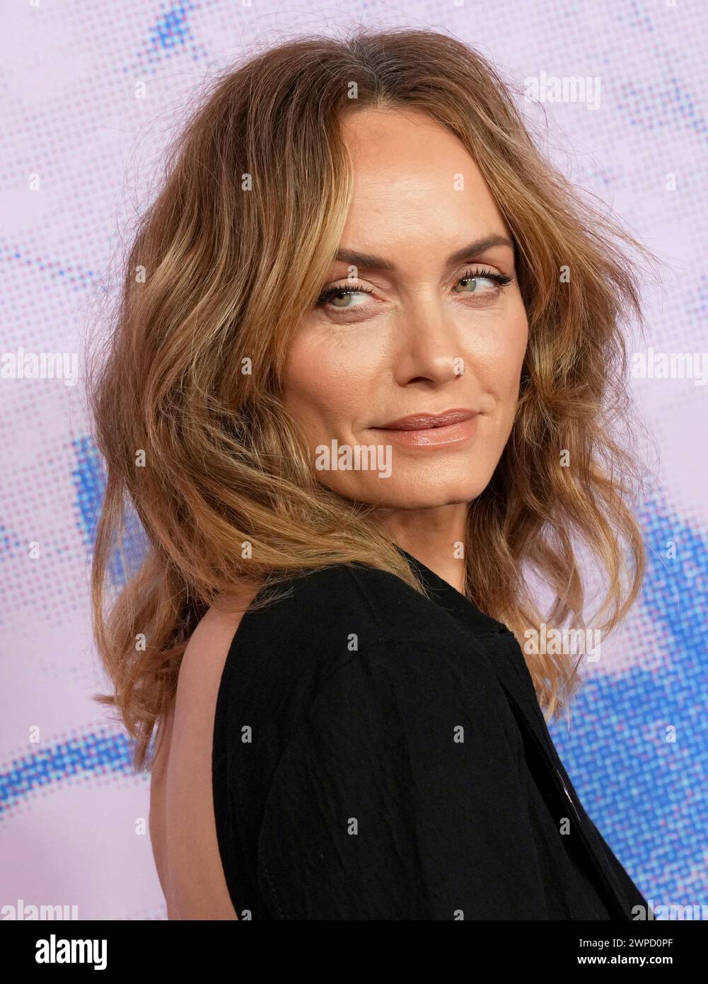 Amber Valletta arrives at the Green Carpet Fashion Awards, Wednesday ...