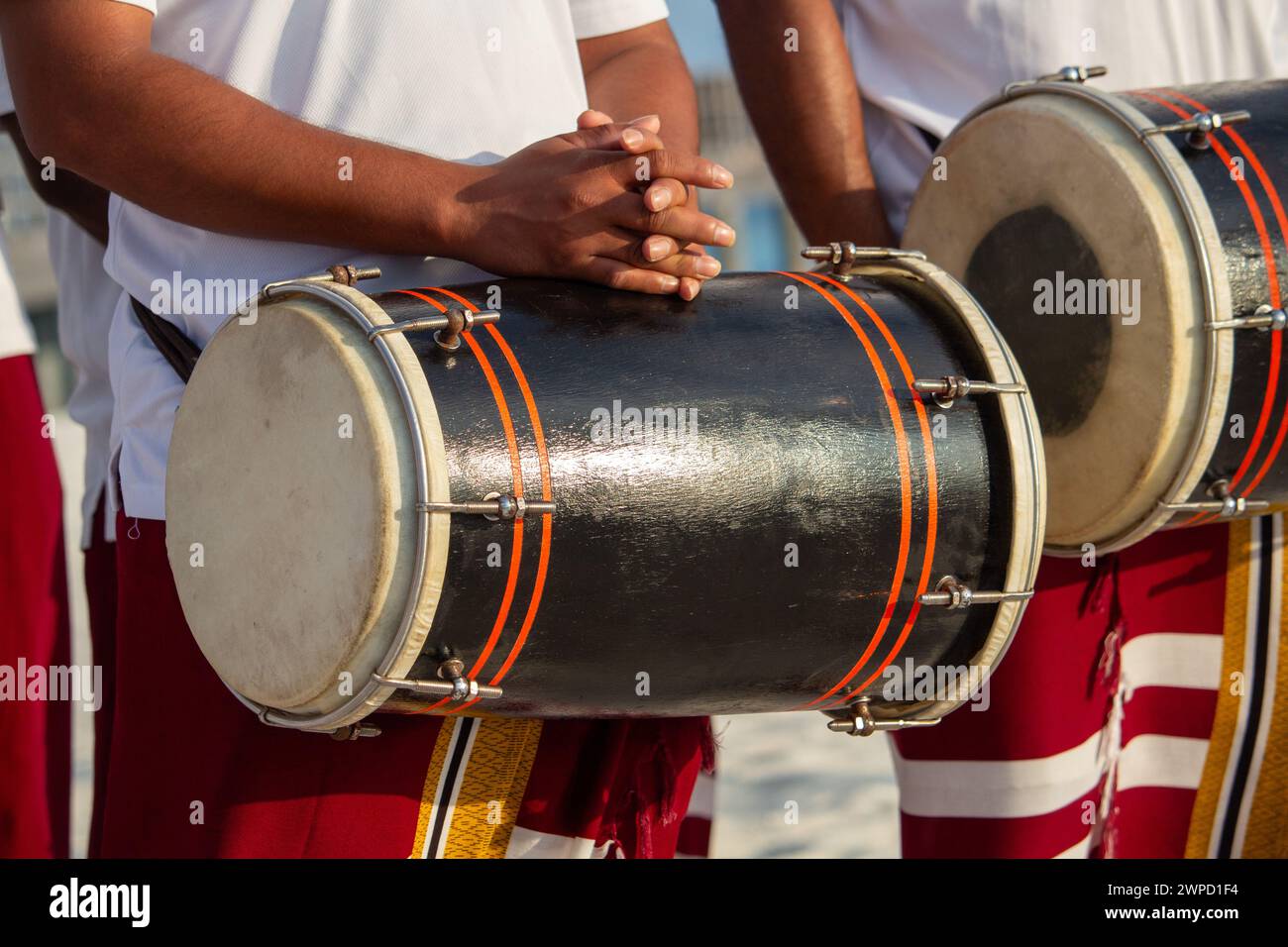 The drummers playing instruments on the beach shore Stock Photo - Alamy